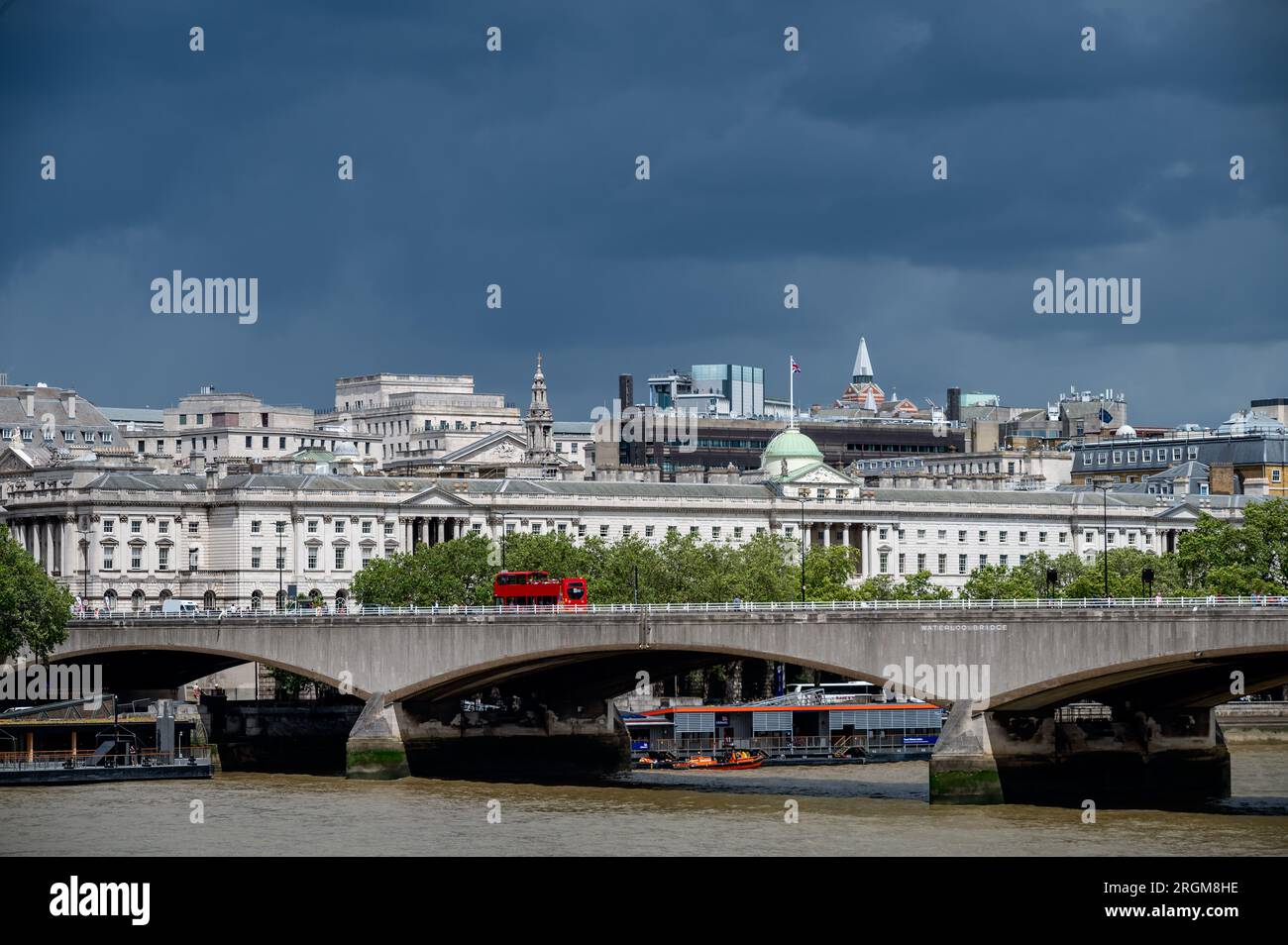 View of Waterloo Bridge and Palace of Westminster on its back at London ...