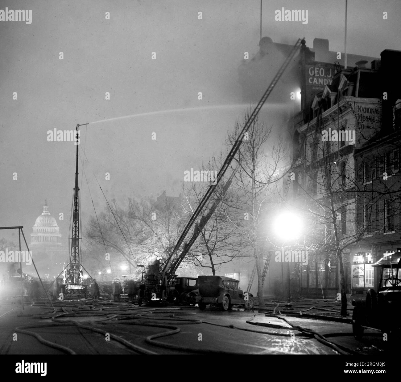 Photograph shows a fire at the George J. Mueller Candy Co., 336 ...
