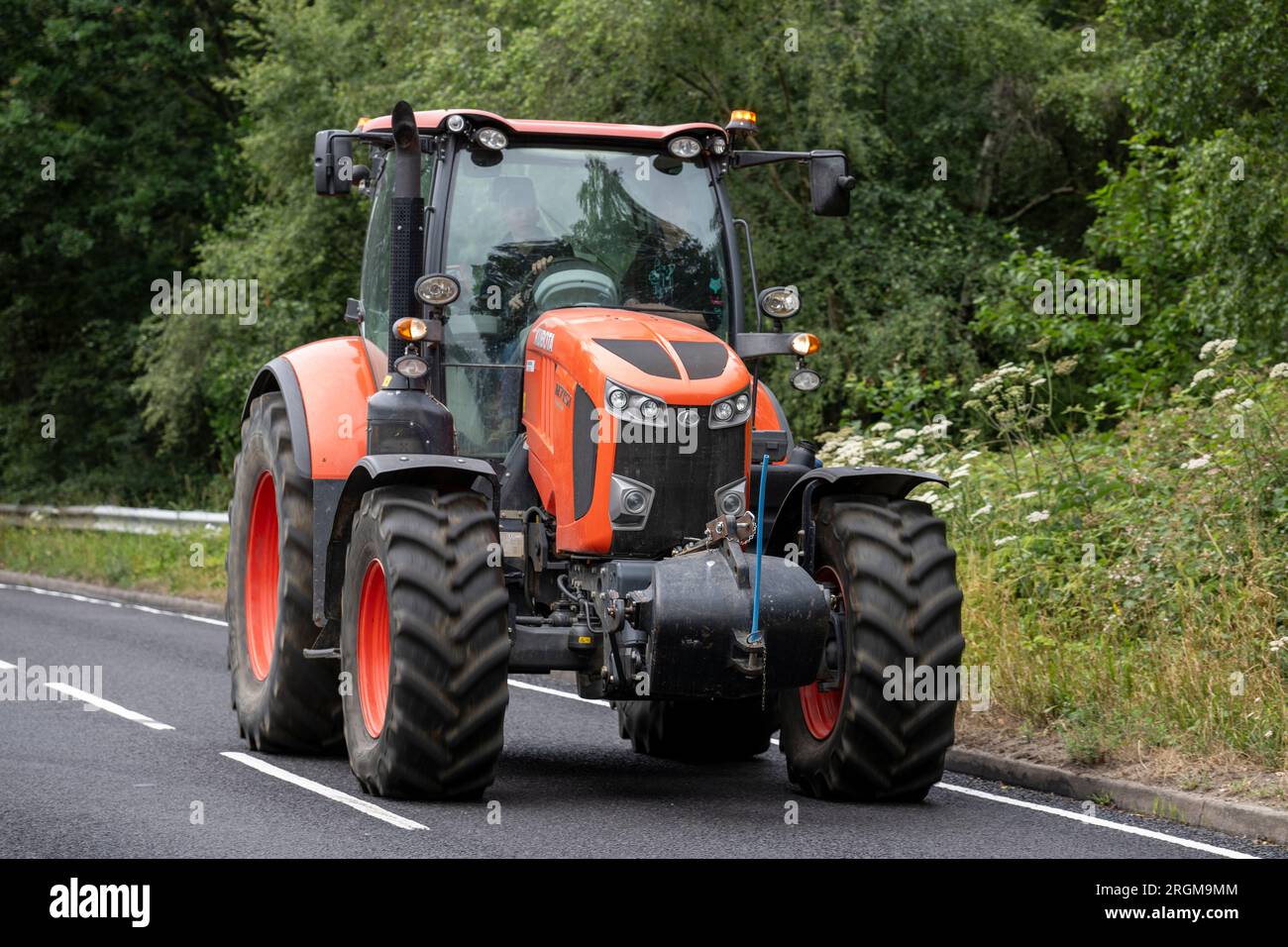 Modern tractor in the new forest national park hi-res stock photography ...
