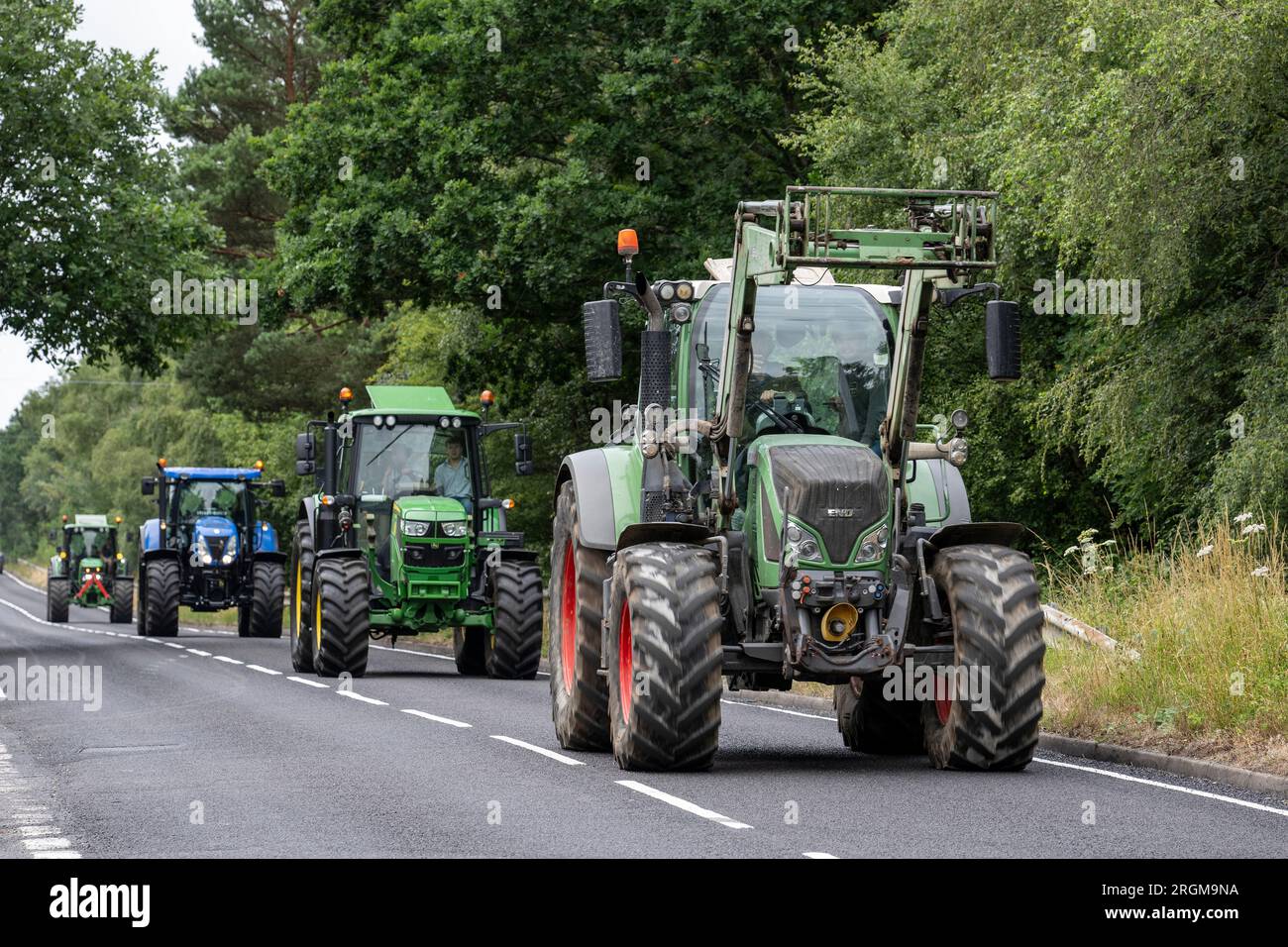 Four tractors in convoy hi-res stock photography and images - Alamy