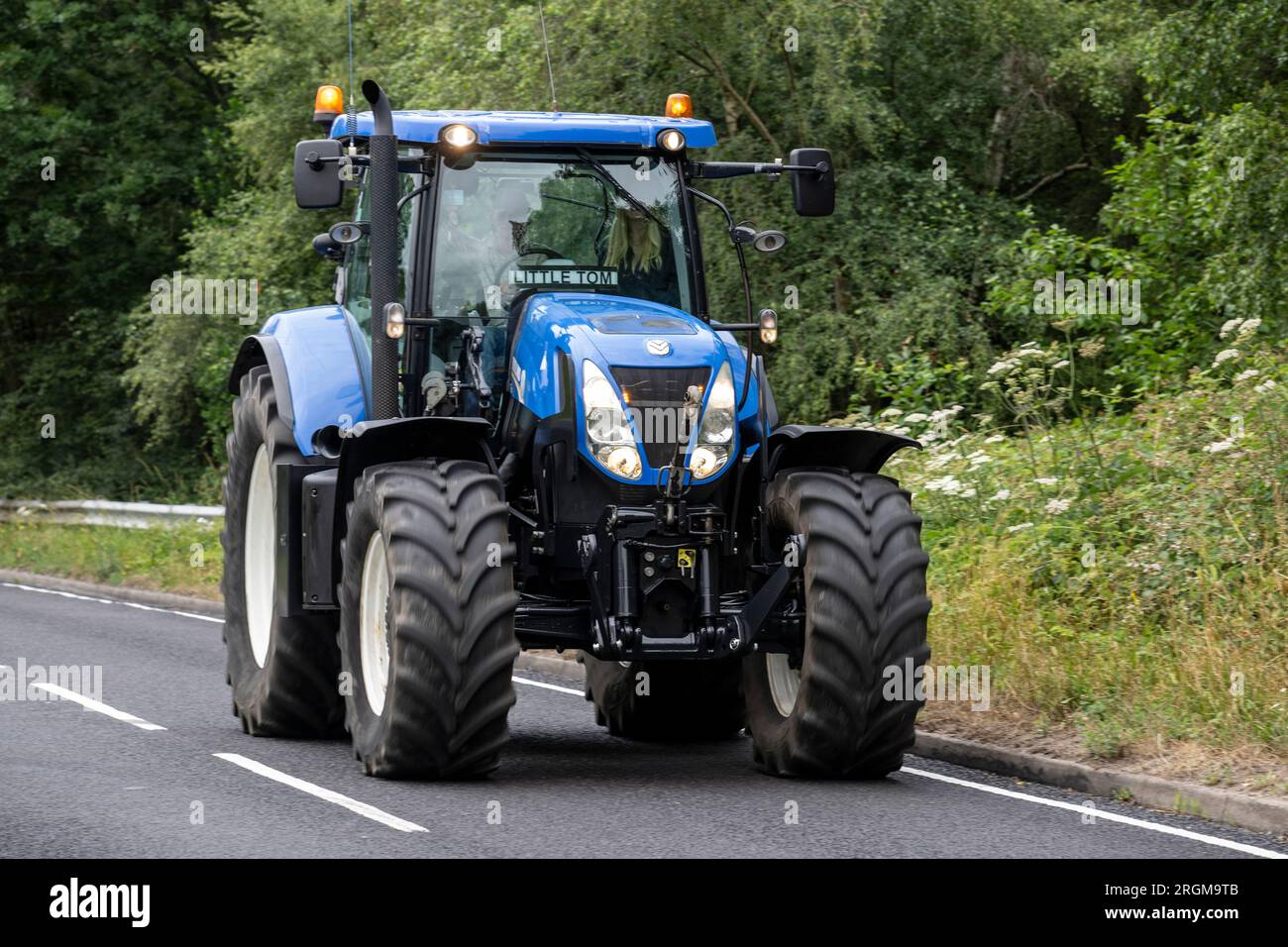 Blue tractor with big headlights hi-res stock photography and images ...