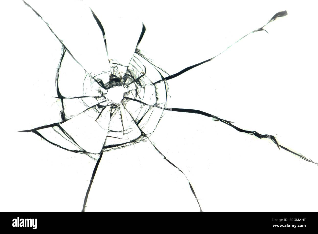 The texture of broken glass. Bullet hole Stock Photo - Alamy