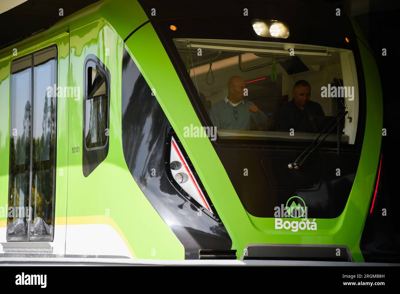 Bogota, Colombia. 10th Aug, 2023. A men sits in the car driver seat ...