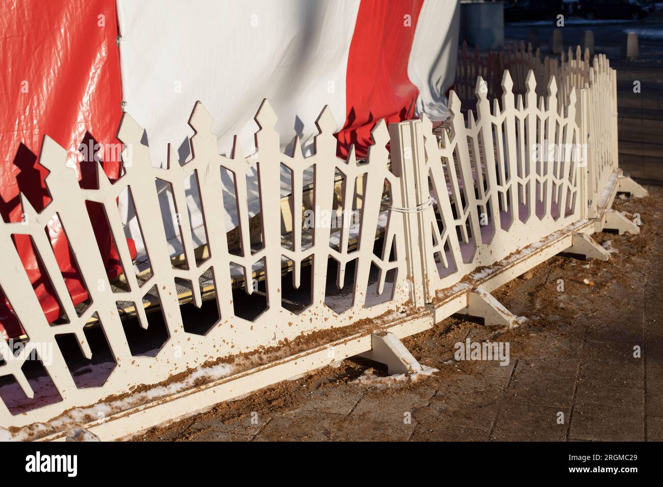 White fence. Small fence made of wood at fair. Details of circus on ...