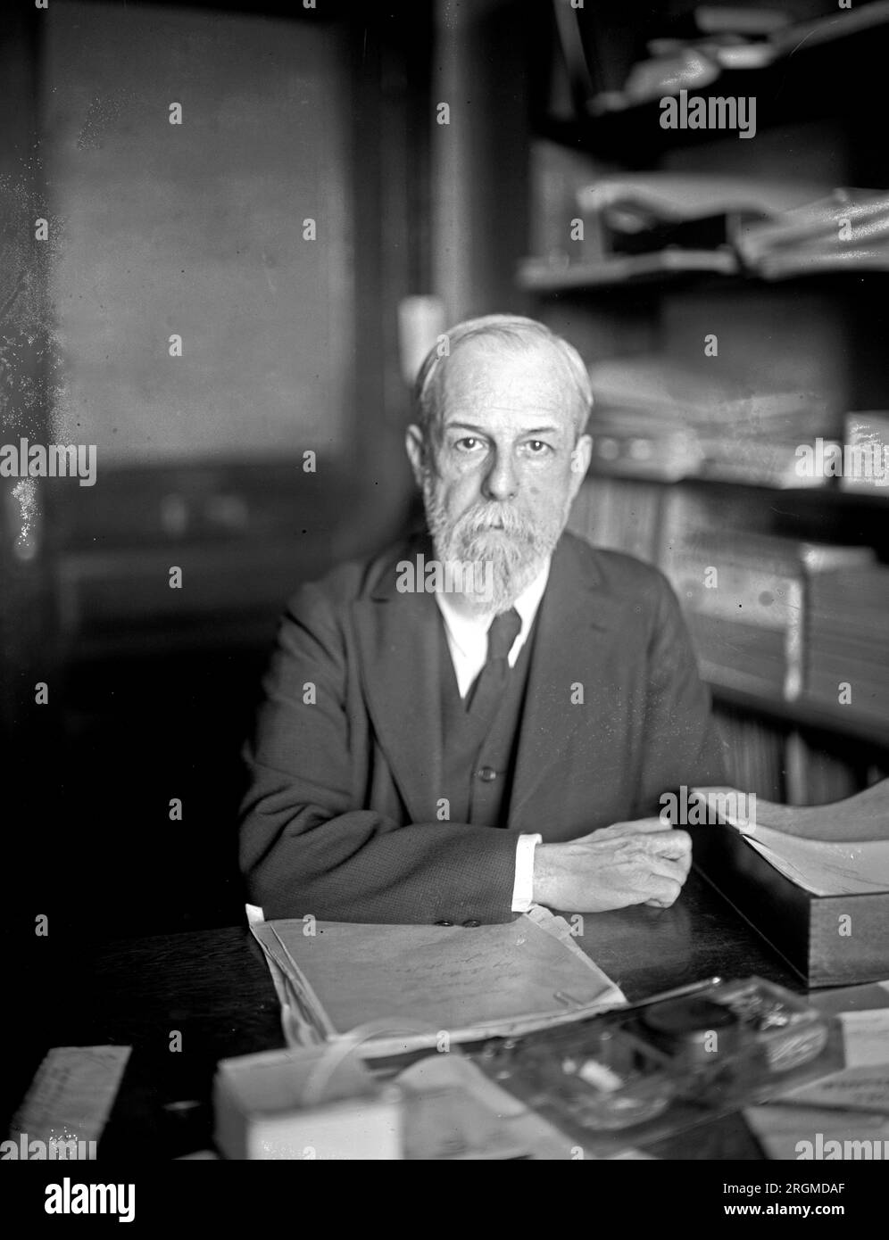 Rudolph P. Miller sitting at a desk ca. 1922 Stock Photo - Alamy