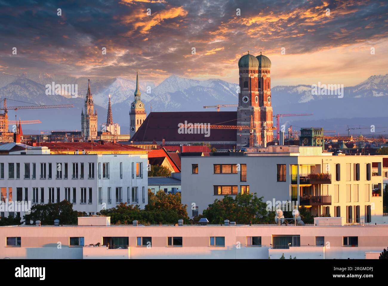Munich Skyline with Alps at sunset Stock Photo - Alamy