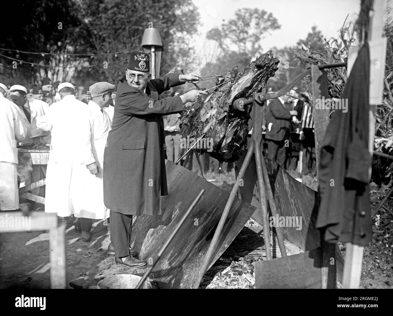 Cooking meat fire Black and White Stock Photos & Images - Alamy