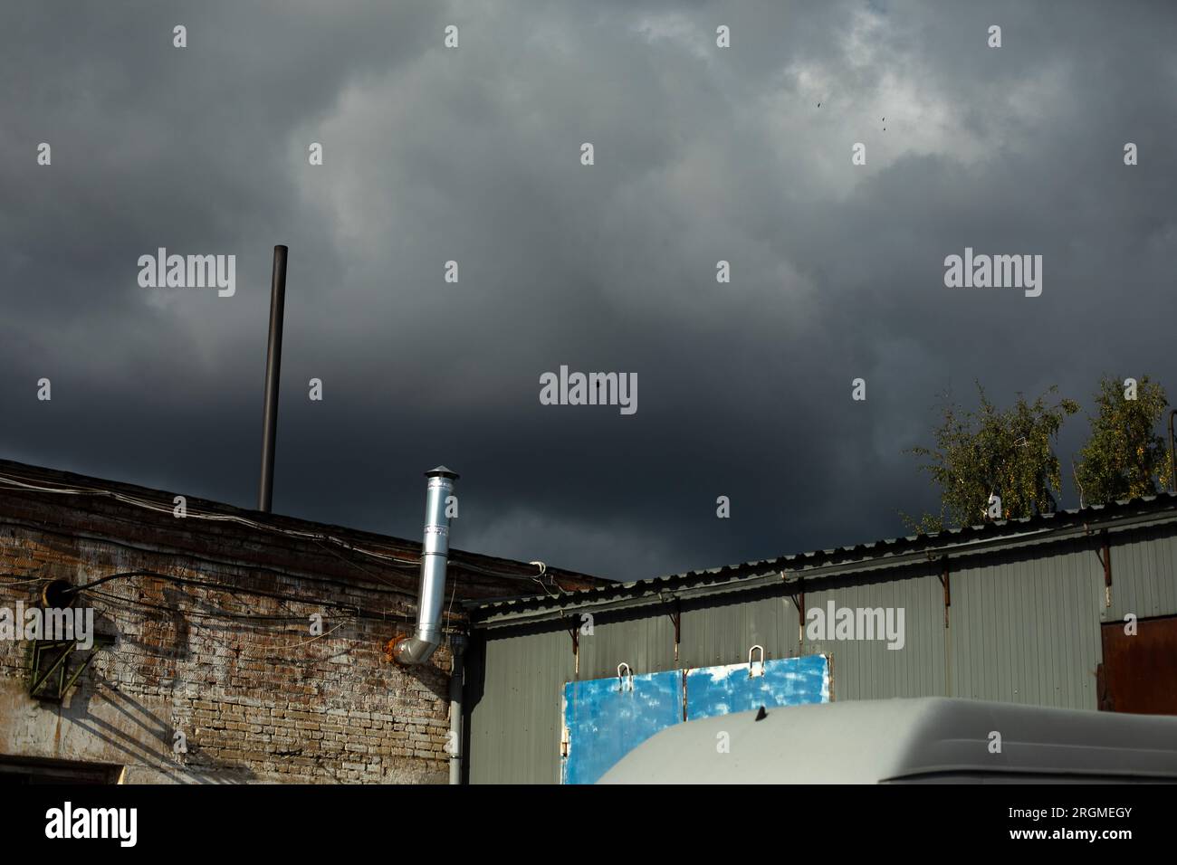 Roof of building with pipe. Brick house. Industrial Building Details ...