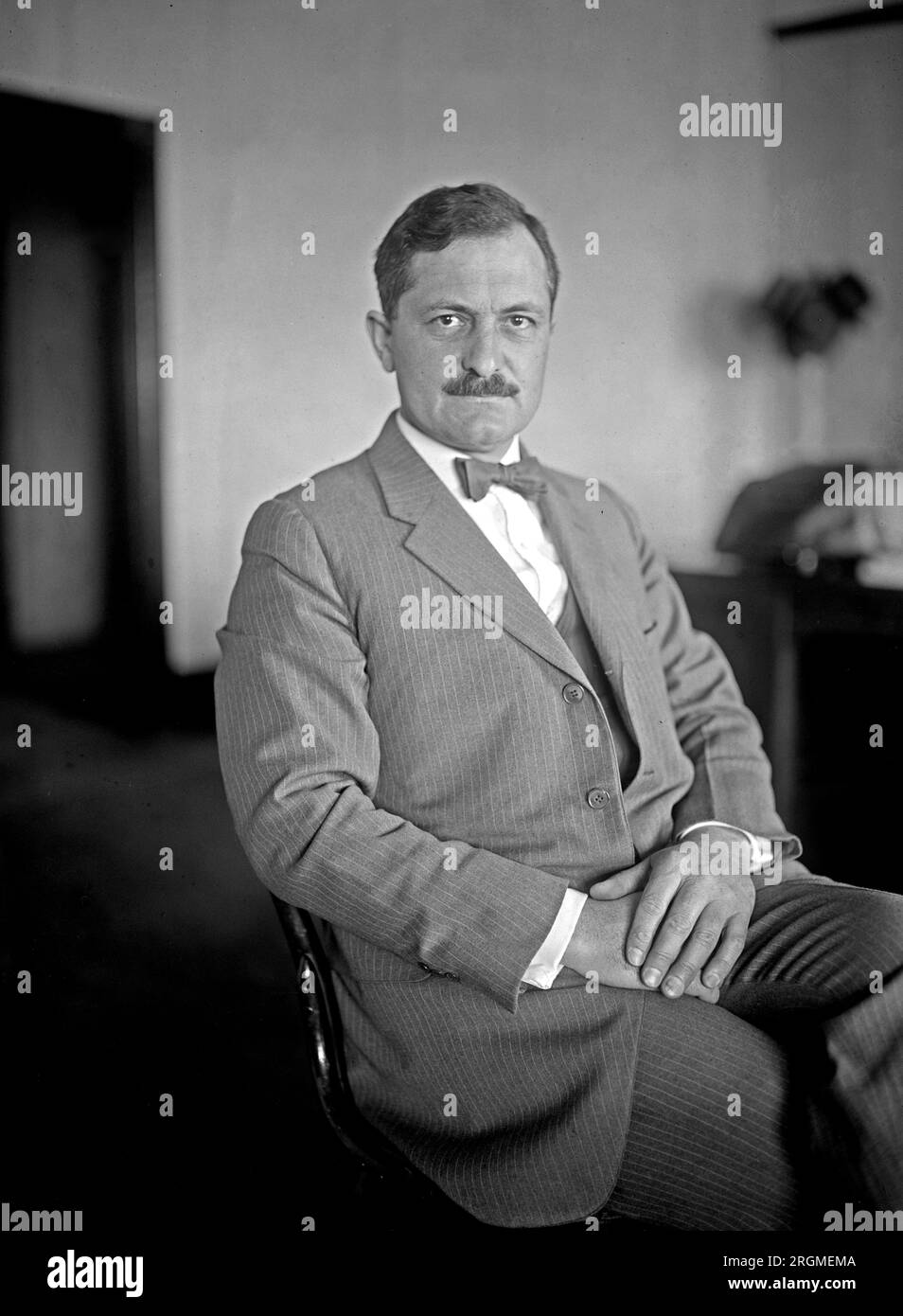 Harry A. Curtis sitting in an office ca. 1923 Stock Photo - Alamy