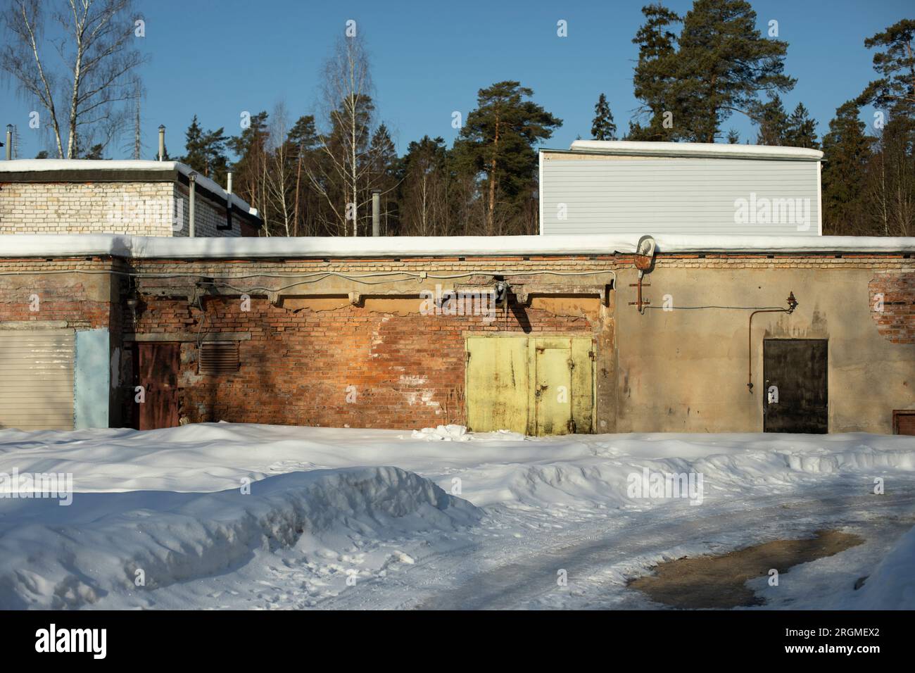 Old buildings in industrial area. Soviet buildings for storing things ...