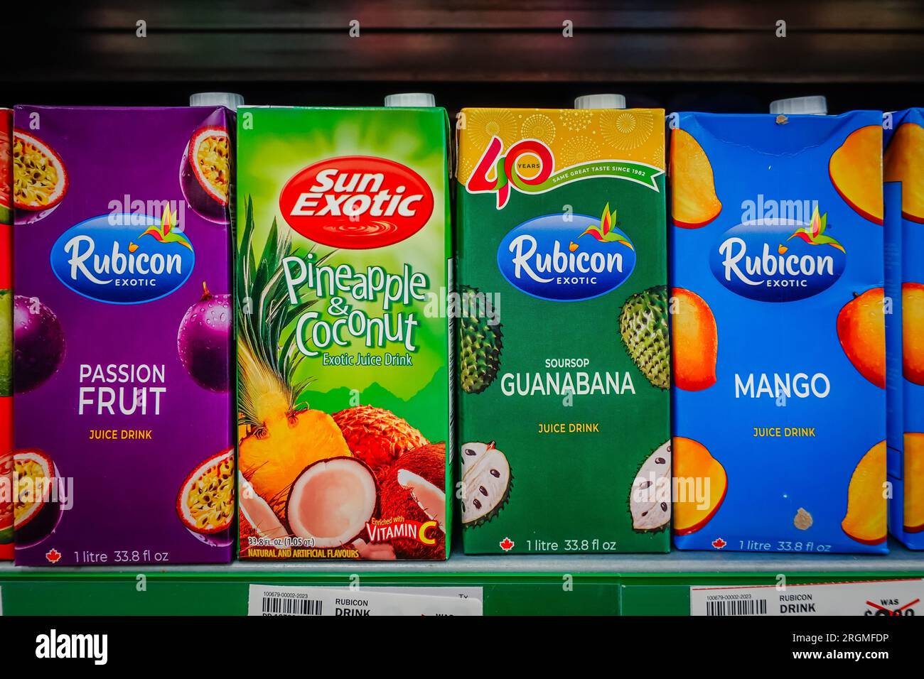 Carton box containers of exotic fruit juices on a supermarket shelf ...