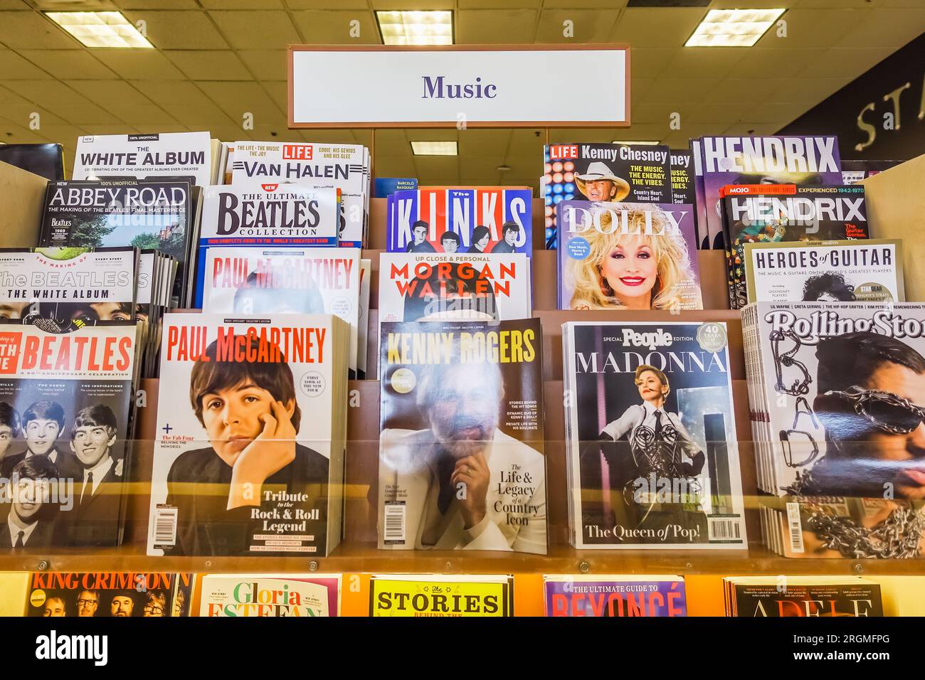 music magazine rack at a bookstore Stock Photo - Alamy