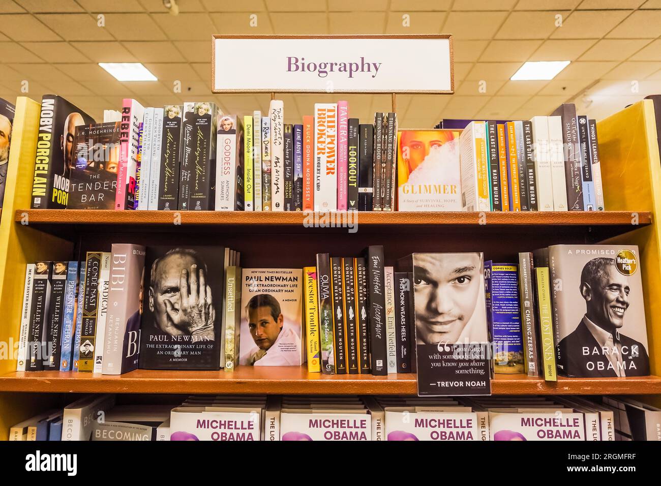 rows of biography books on a bookshelf in a bookstore Stock Photo - Alamy