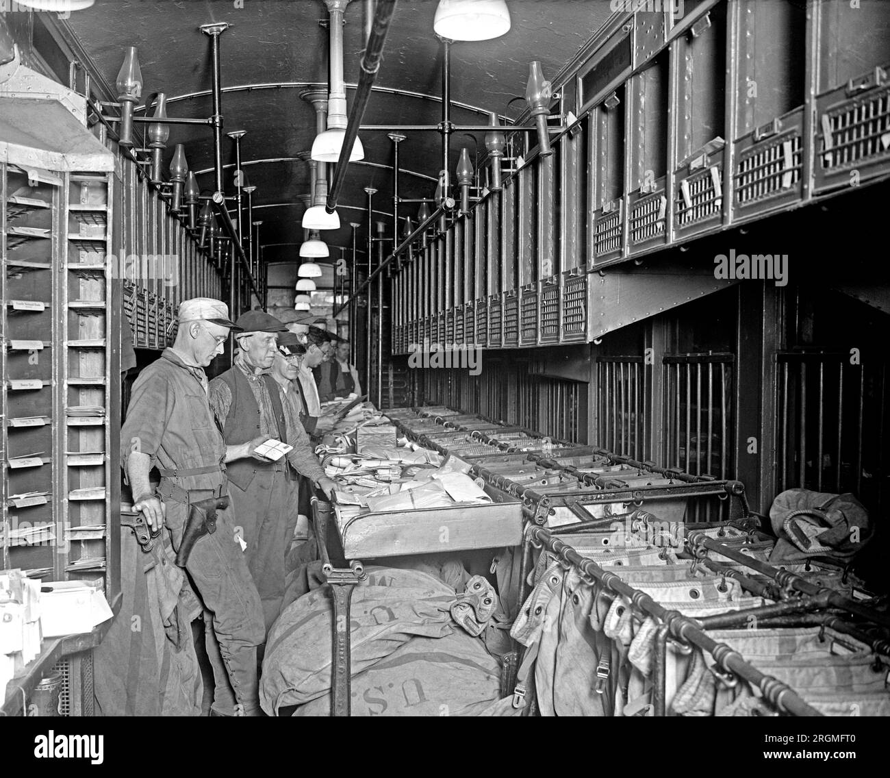 Railway mail service workers (railroad car interior) ca. 1924 Stock ...