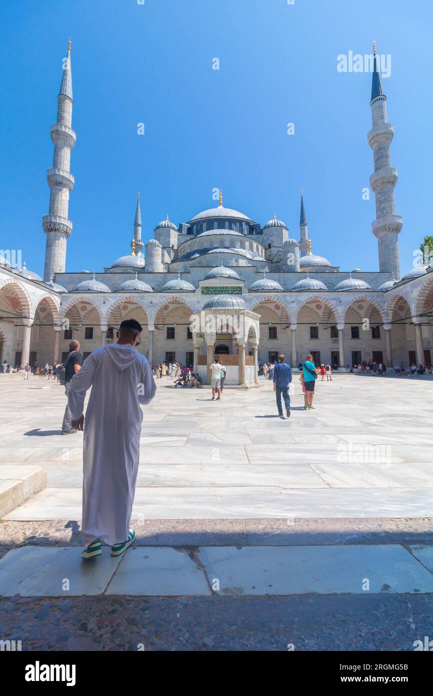 Visit Istanbul background vertical photo. Tourists in courtyard of Blue ...