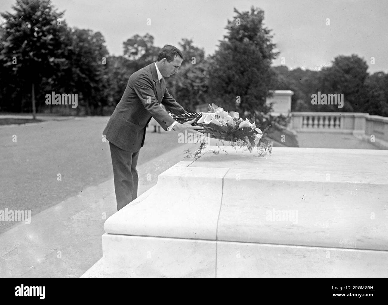 Ralph L. Chambers placing a wreath at Arlington National Cemetery ca ...