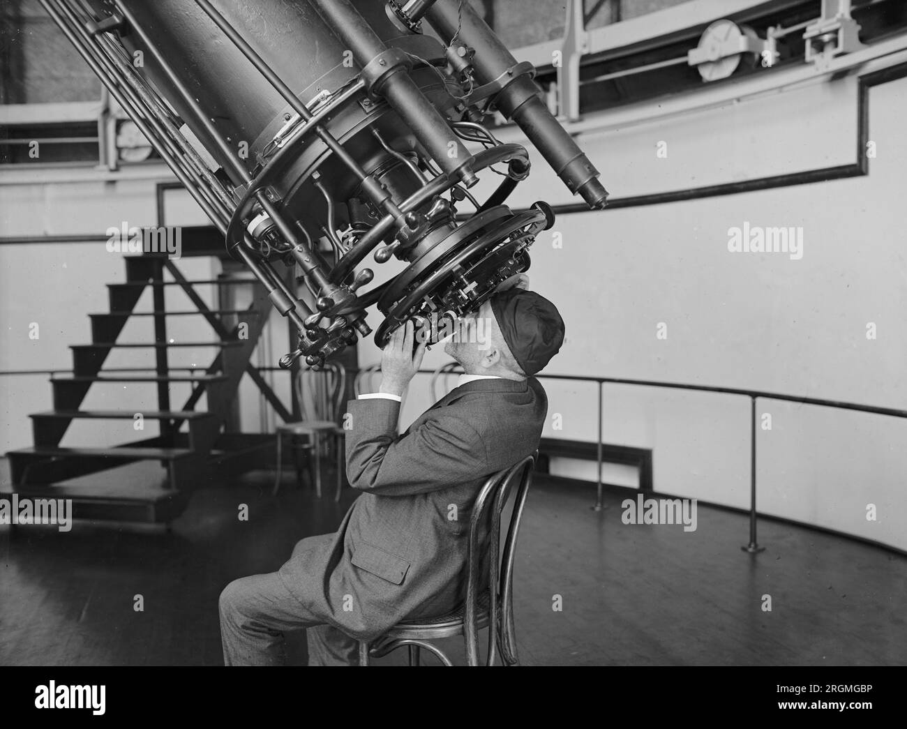 Professor Hall of the U.S. Naval Observatory with 26 inch telescope ca ...