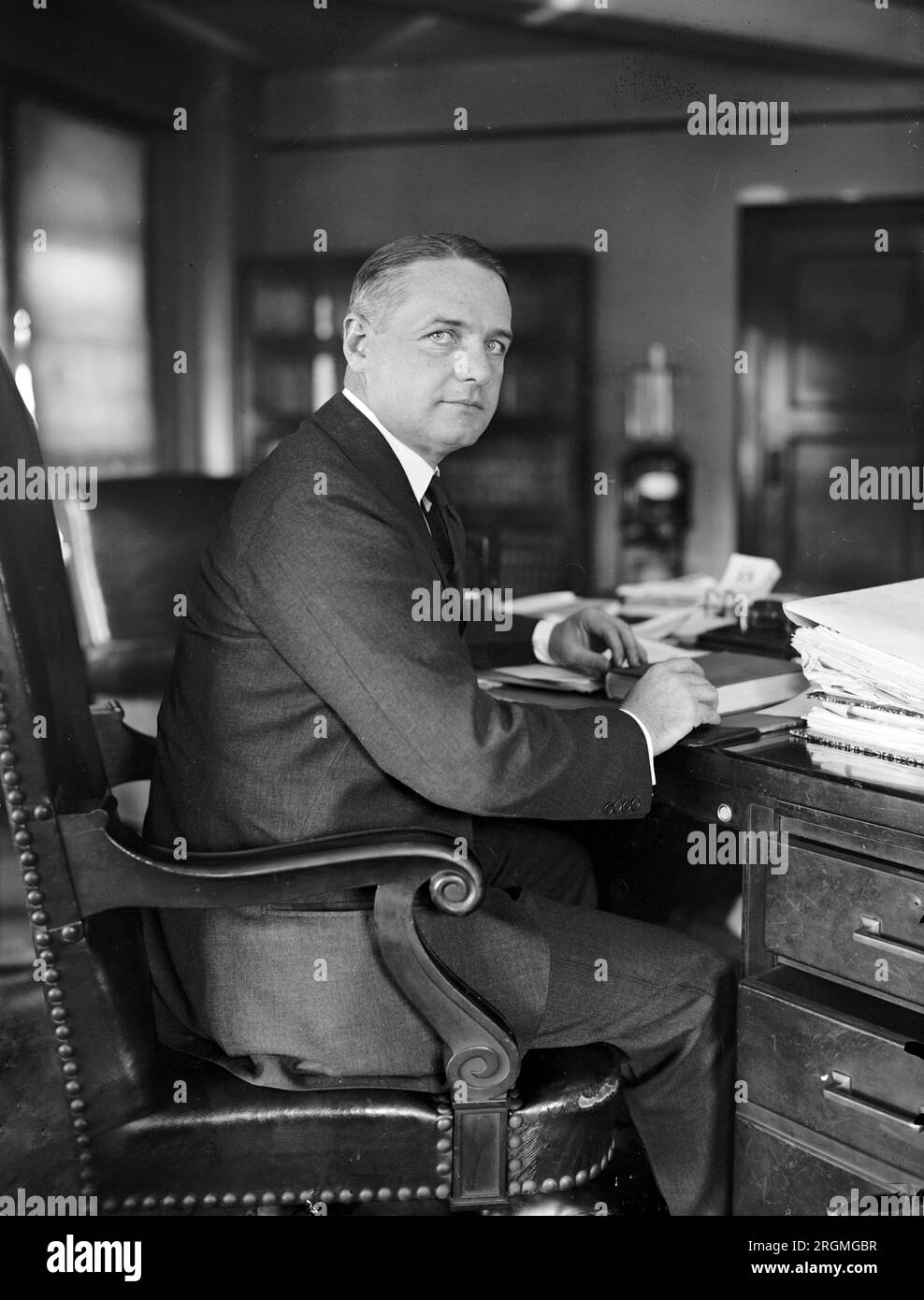 William J. Donovan, Assistant Attorney General sitting at his desk ca ...