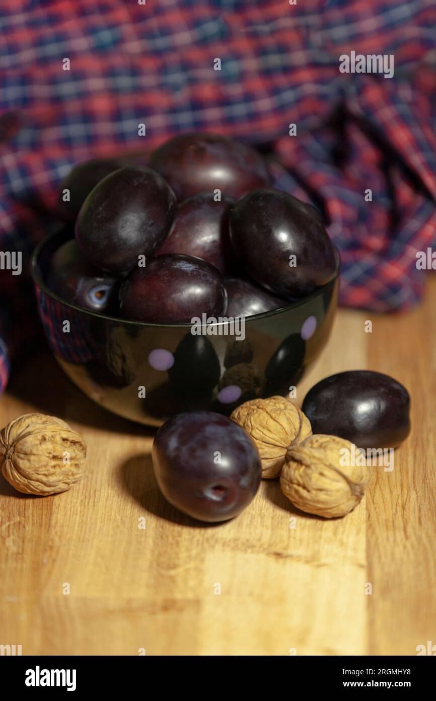 Shell as a bowl with plums hi-res stock photography and images - Alamy