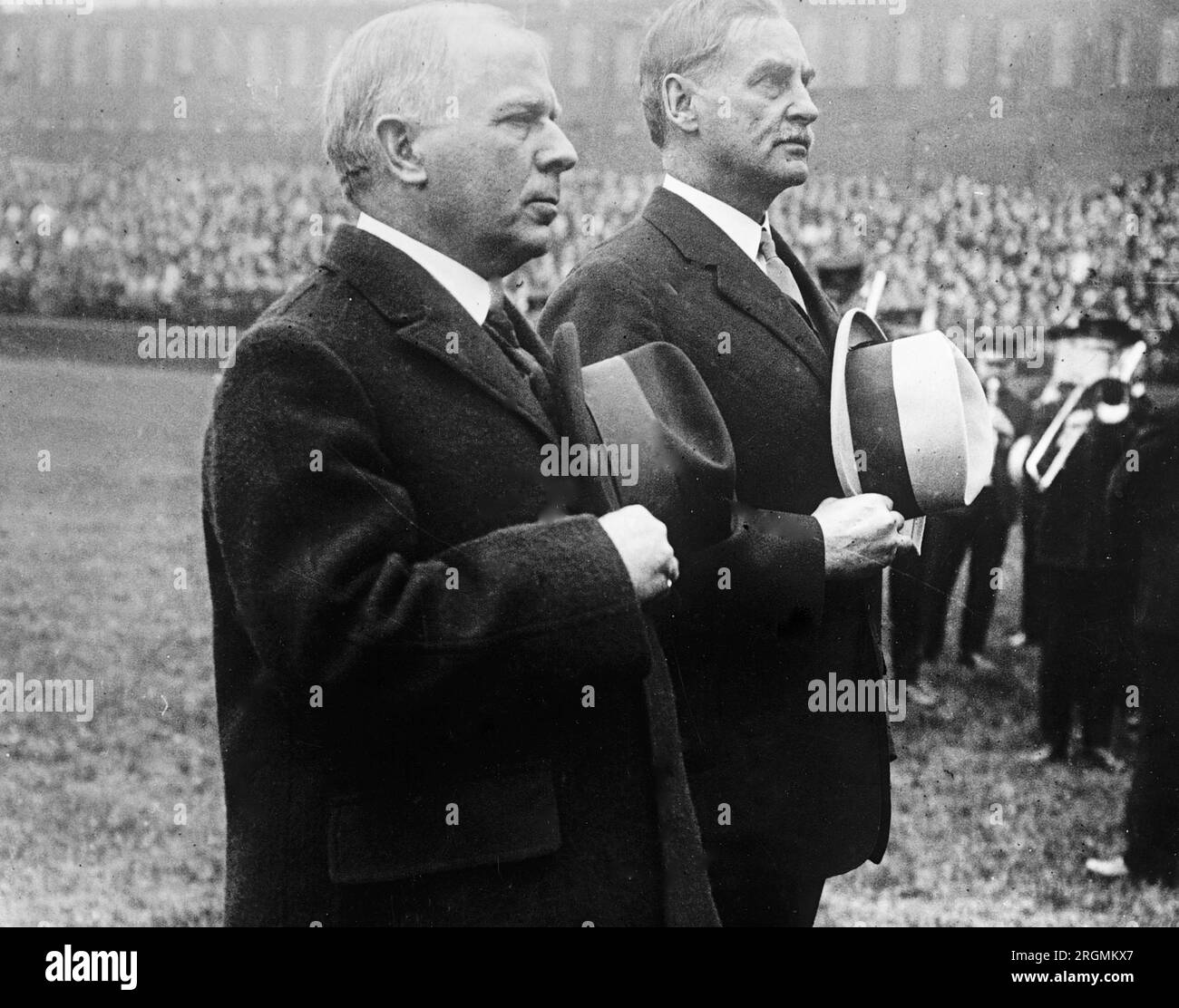 Senator George Pepper, with hat held over heart during pre-game ...