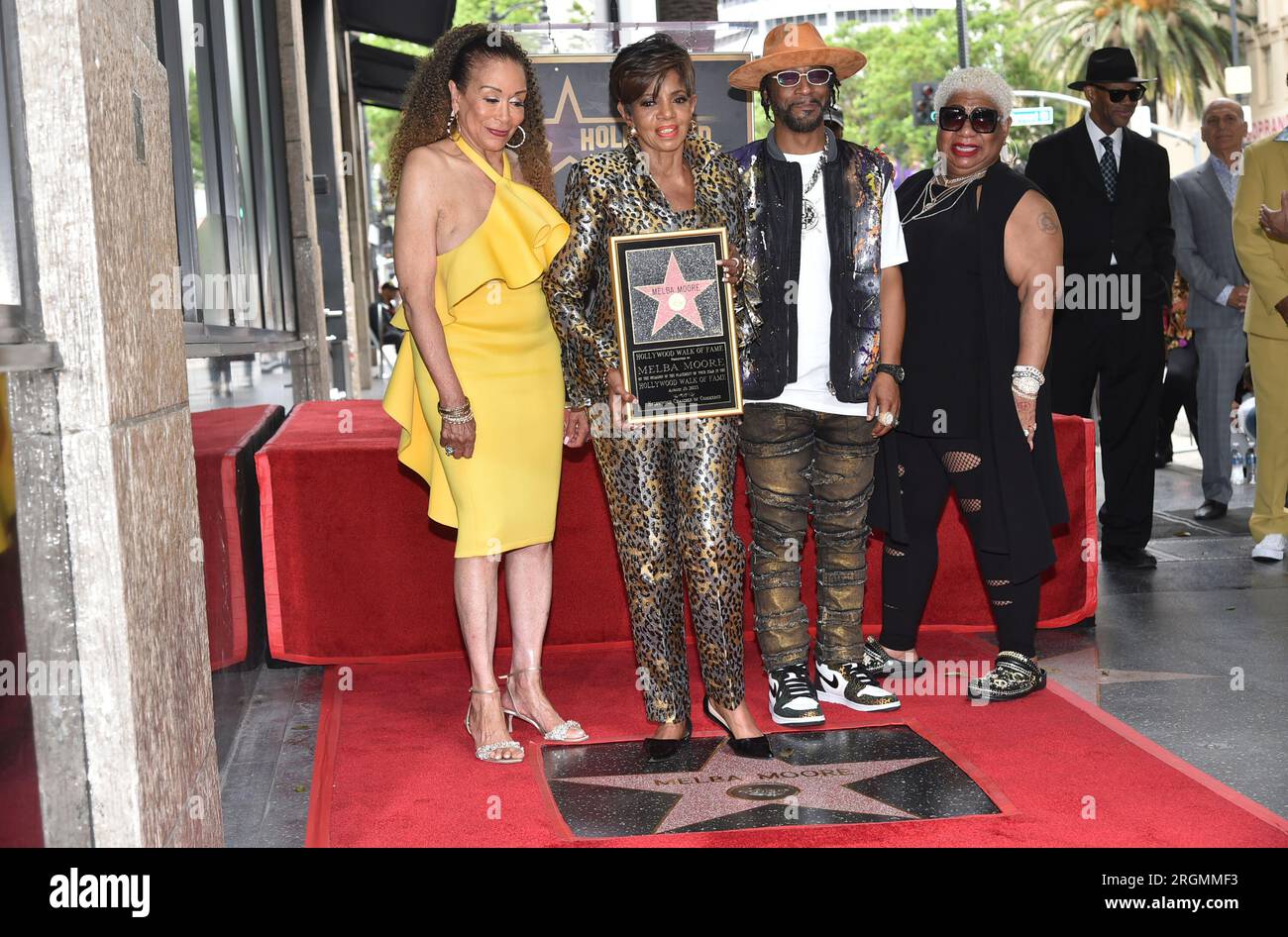 Actress and singer Melba Moore holds a replica of her star on the ...
