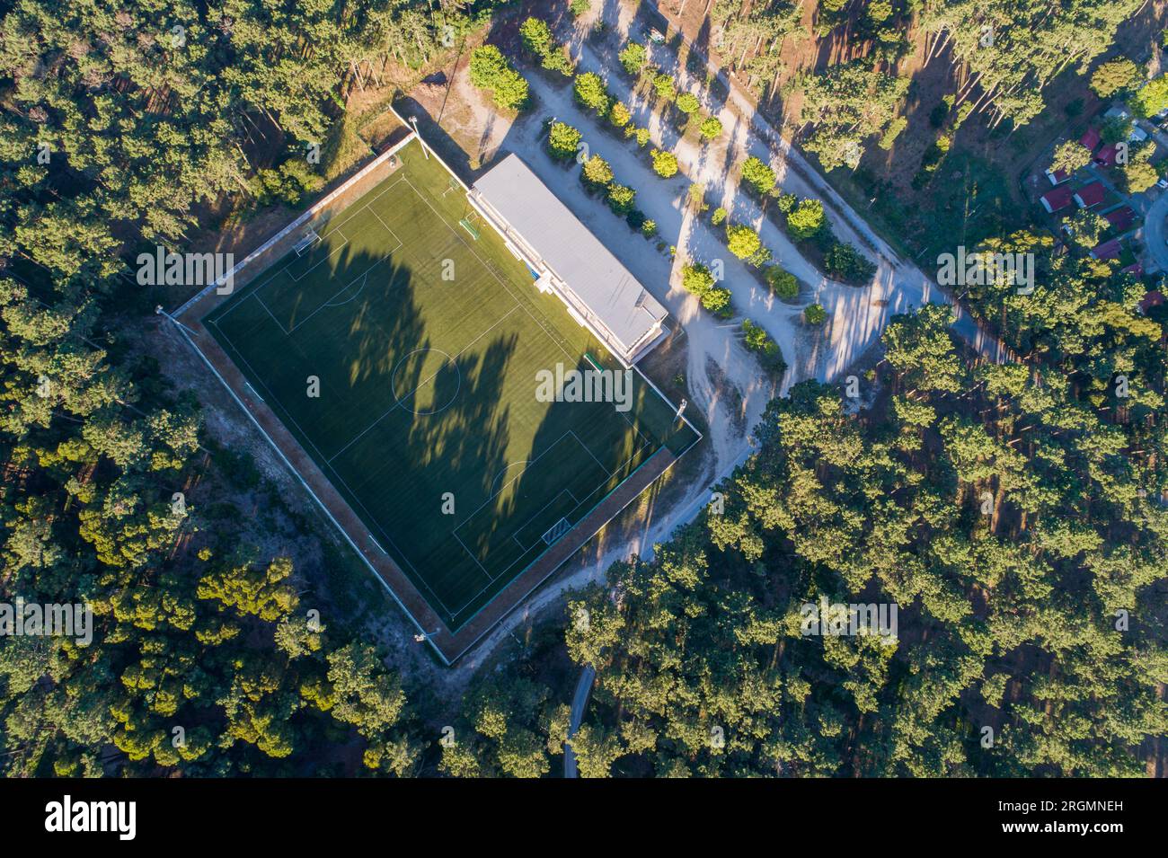 aerial view of a soccer field in a pine forest Stock Photo - Alamy