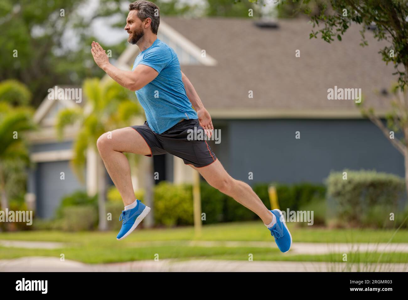 Sport runner. Man running. Fit male sport fitness model sprinting ...