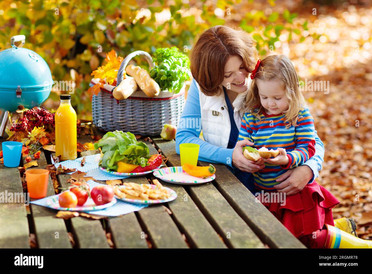 Picnic in autumn park. Family fall outdoor barbeque grill party ...