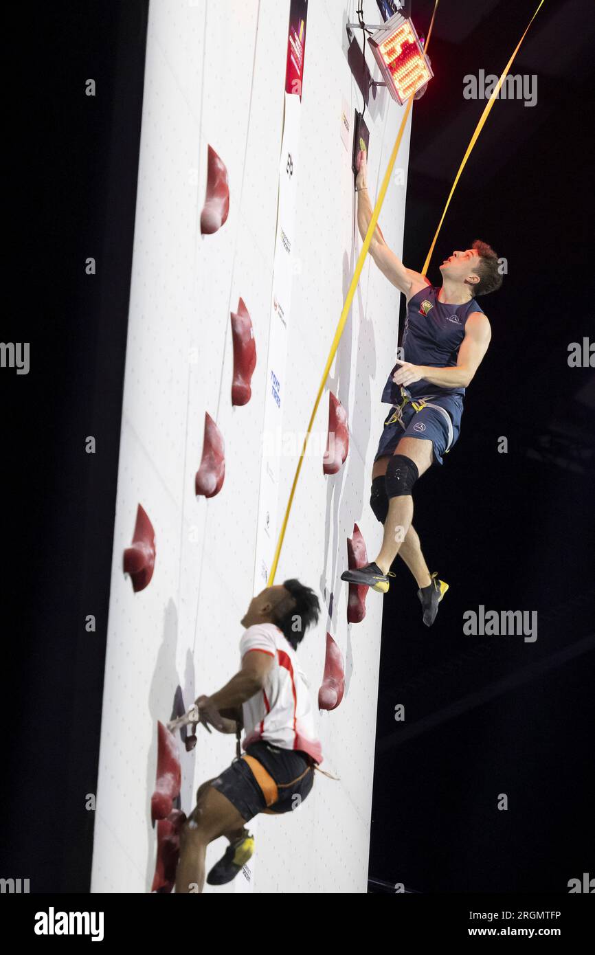 Italy's Matteo Zurloni, top, and Indonesia's Rahmad Adi Mulyono, bottom ...