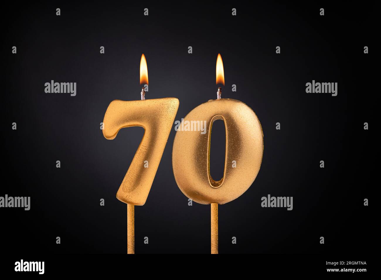 Birthday candle number 70 - Birthday celebration on black background ...