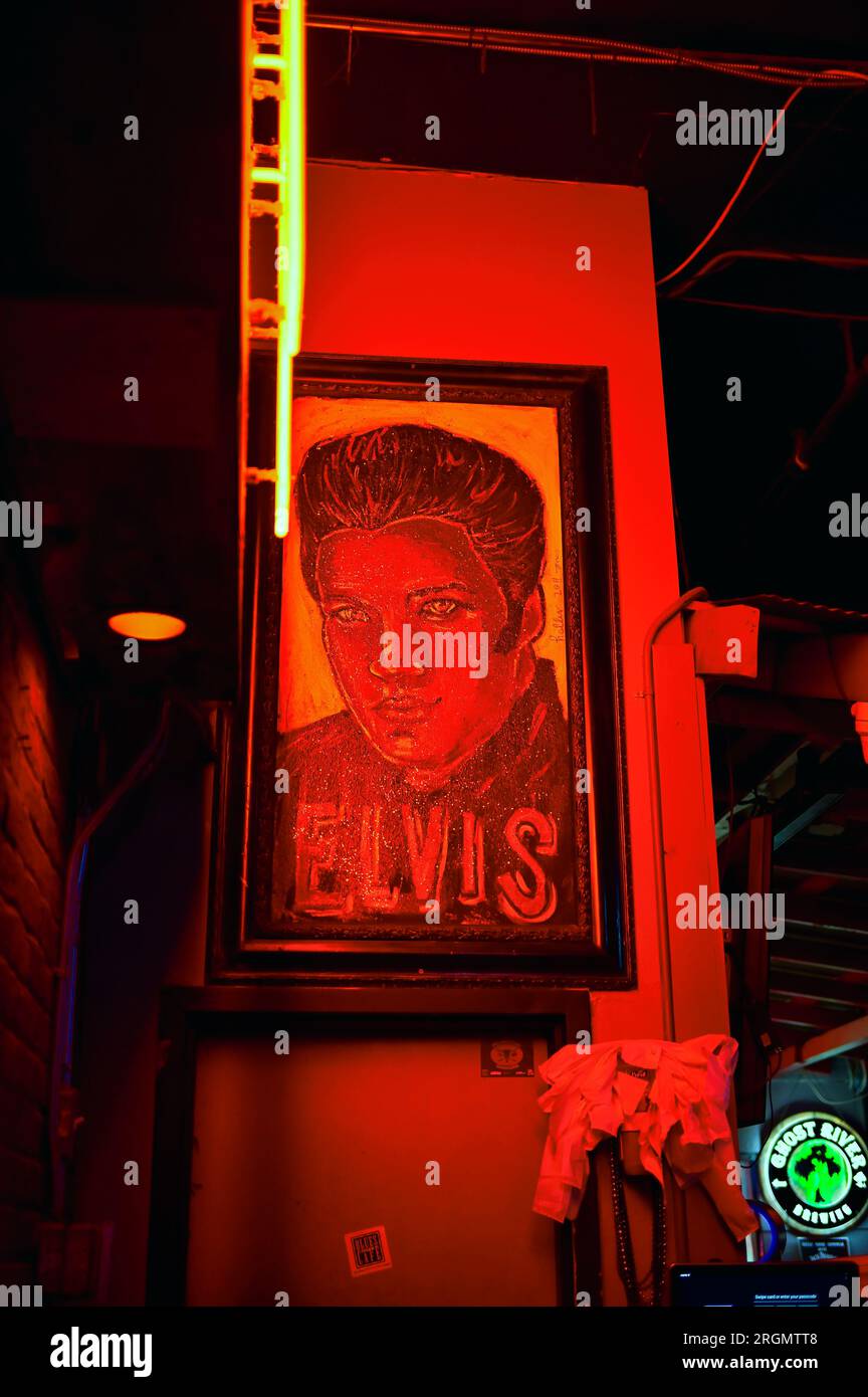 Red Neon glow on Elvis painting in Memphis Stock Photo - Alamy