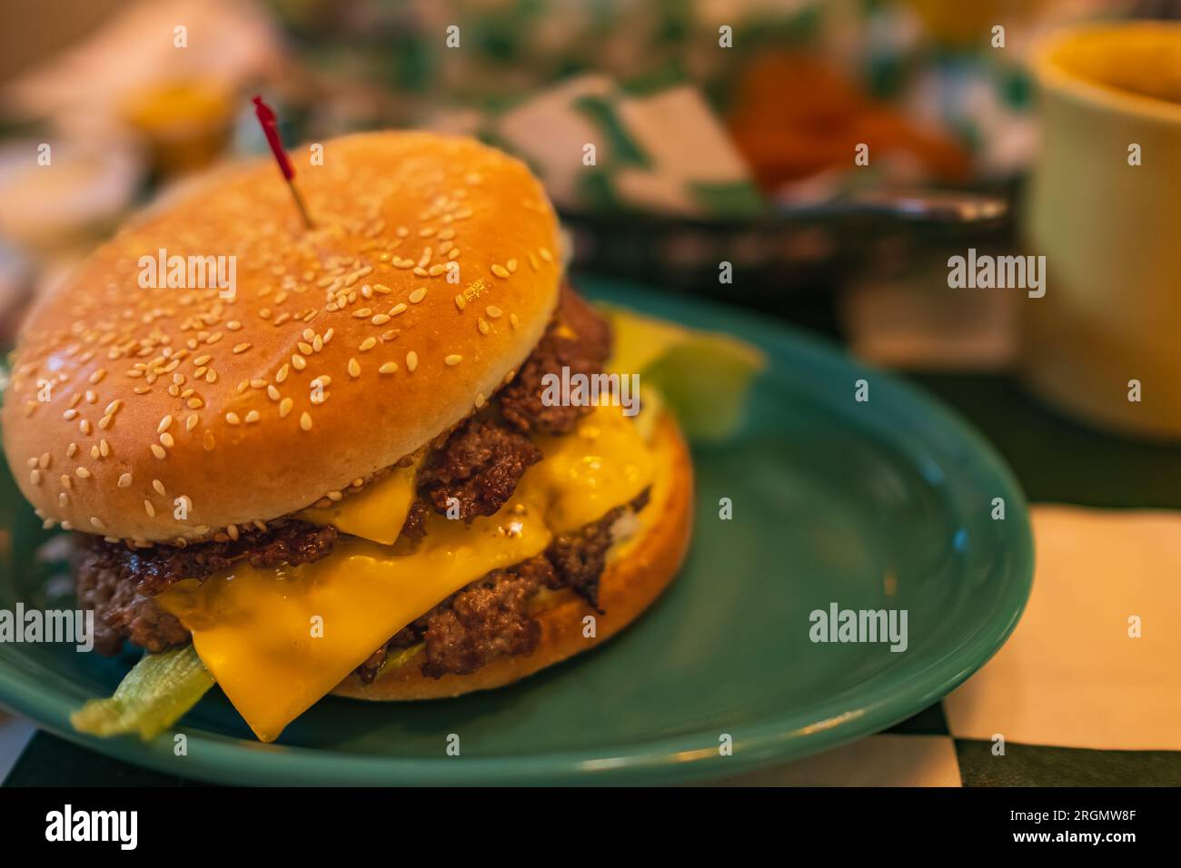 Double meet Burger with melting cheddar cheese. Cheeseburger burger ...