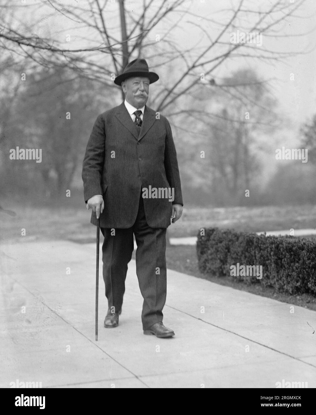 William Howard Taft using a walking stick ca. 1923 Stock Photo - Alamy