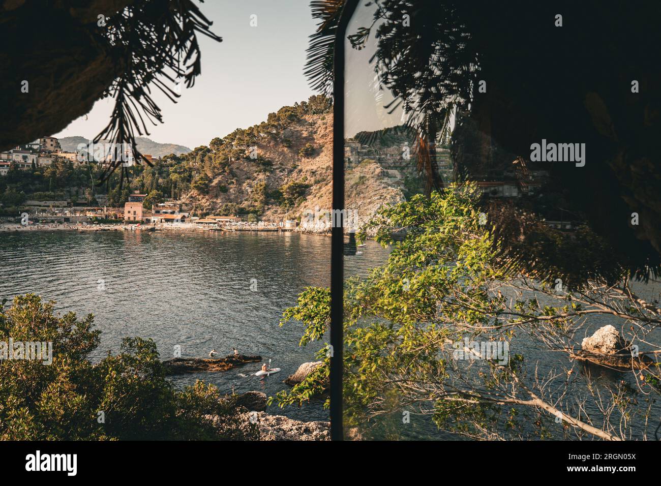 View seen from a window into the landscape of Taormina, Sicily in Italy ...