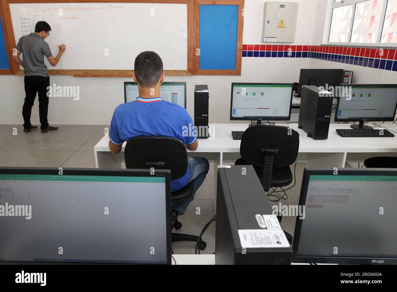 aracatu, bahia, brazil - july 7, 2023: A student is seen in a computer ...