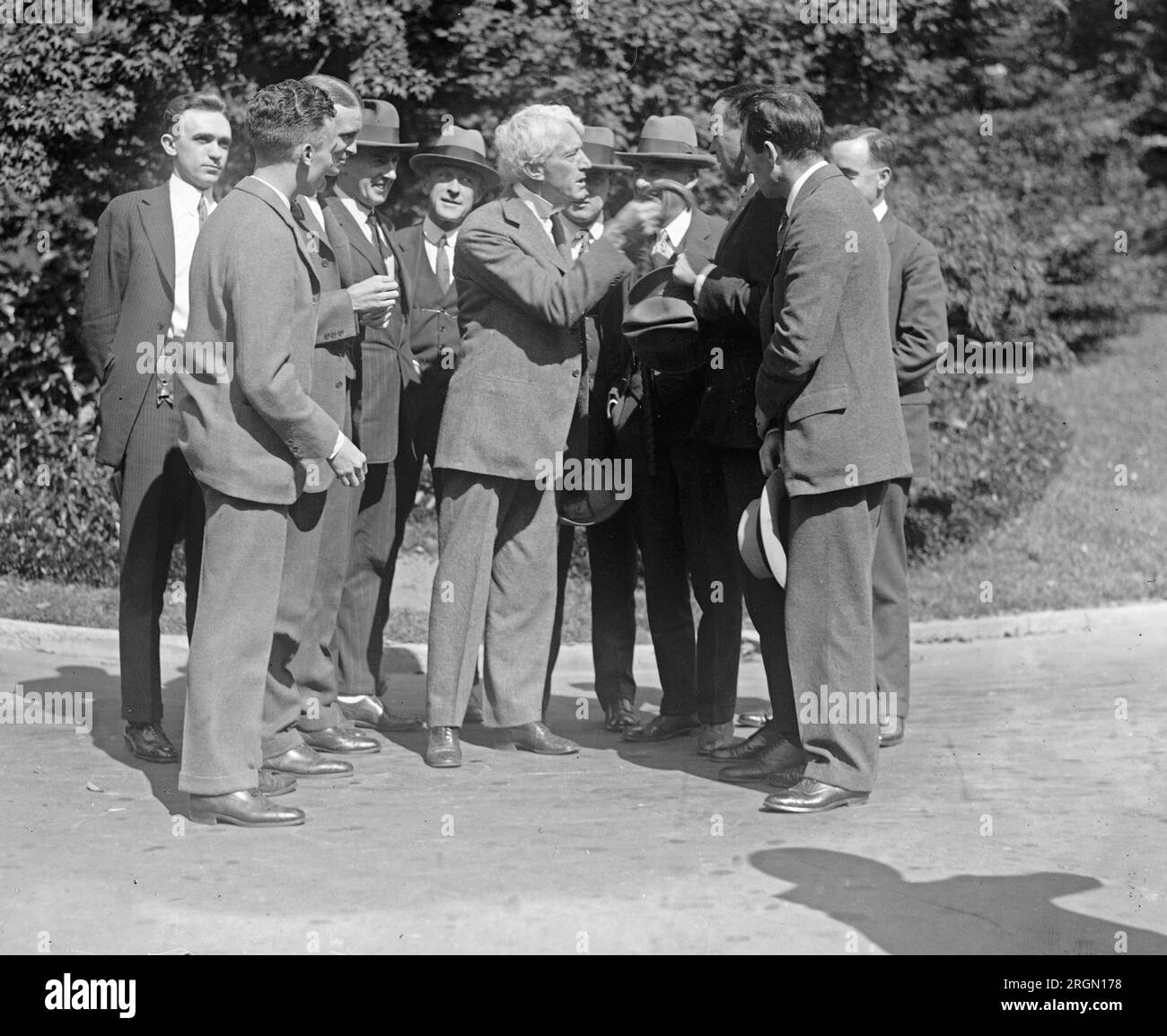 Judge Keenesaw Mountain Landis with newspaper men at the White House ca ...