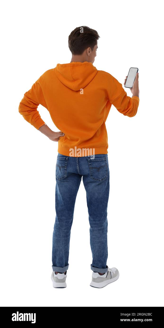 Man holding phone with blank screen on white background, back view ...