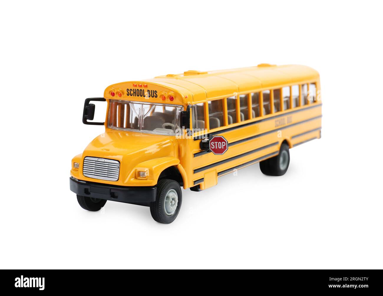 Yellow school bus isolated on white. Children's toy Stock Photo - Alamy