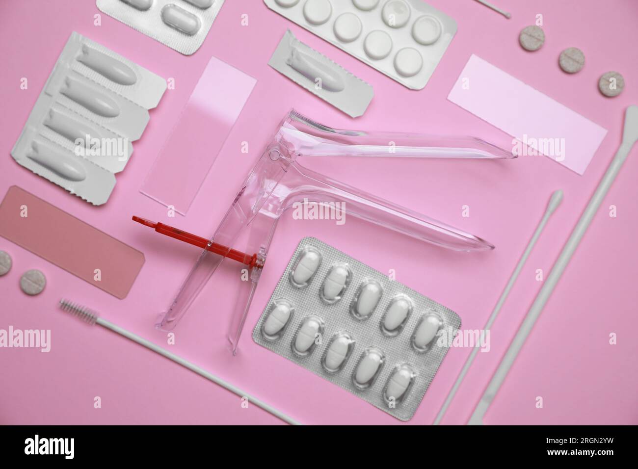 Sterile gynecological examination kit and medicaments on pink ...