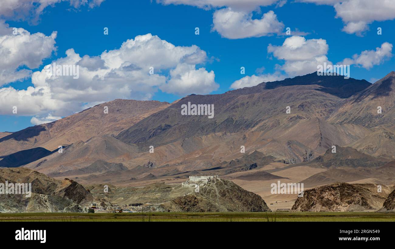 Hanle monastery on top of a hill with mountains and clouds at Ladakh ...
