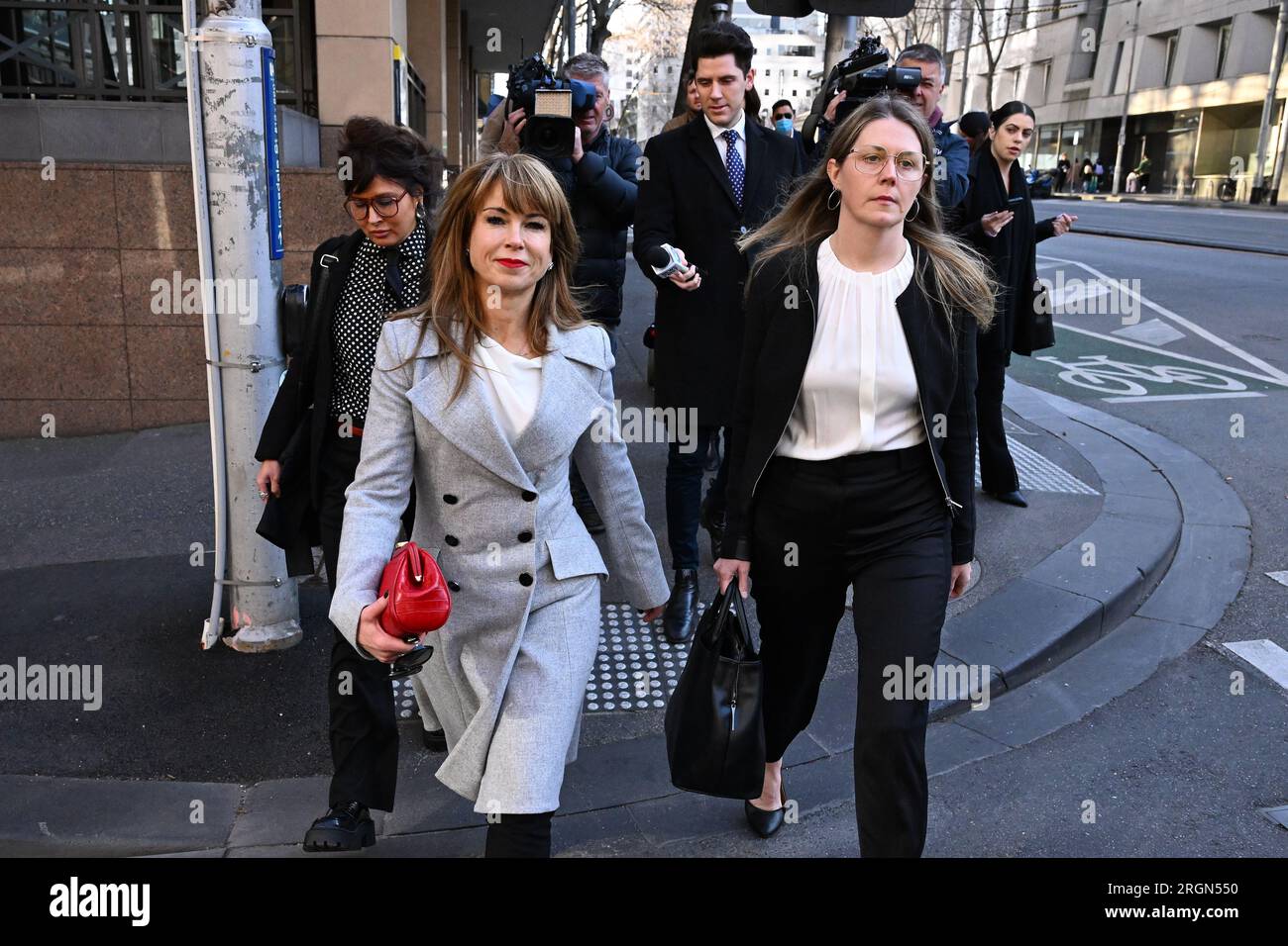 Melbourne, Australia. 11th Aug, 2023. Emma Walters (2nd left) departs ...