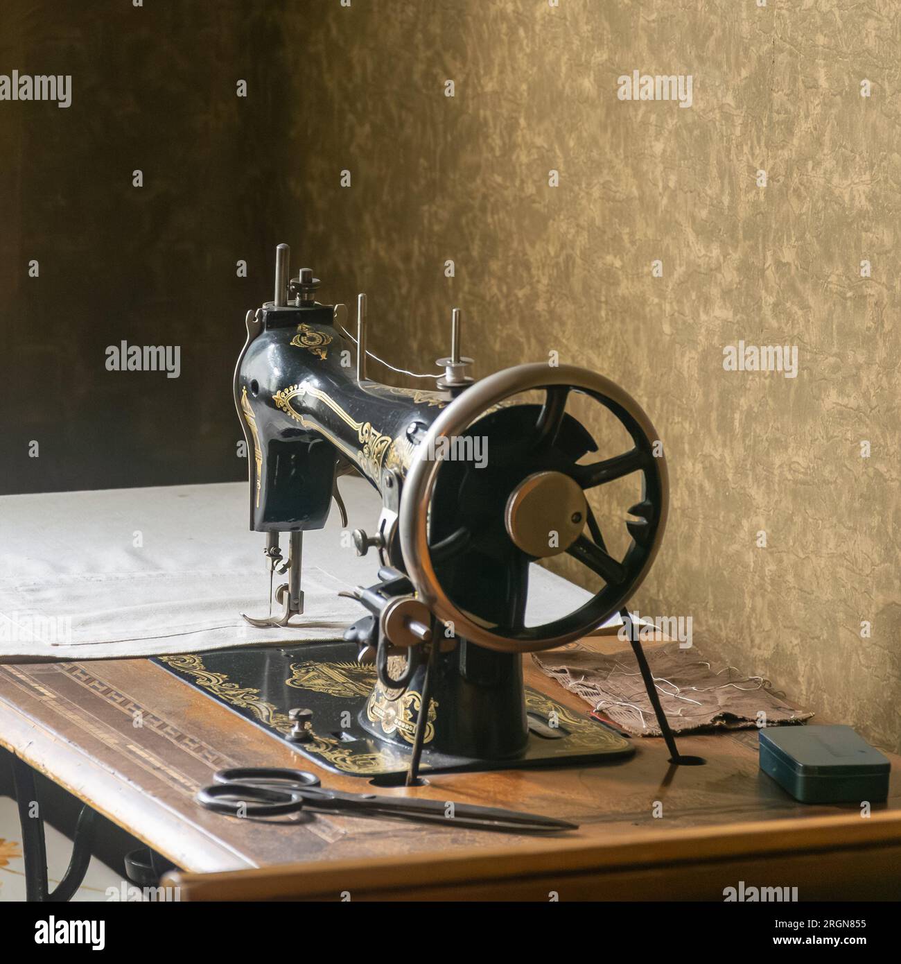 Old machanical sewing machine on table in Amuri museum of historic ...