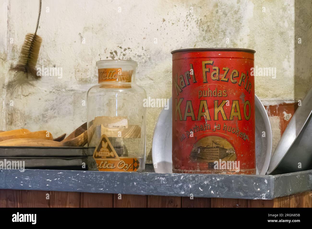 Tin of cocoa and other items on shelf in Amuri museum of historic ...
