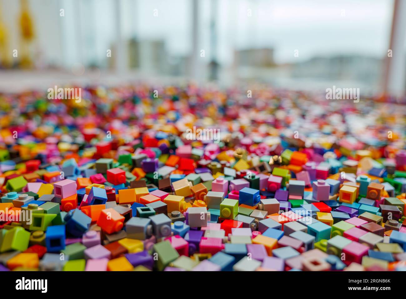 Billund, Denmark - 06 OCTOBER 2022: Selective focus at colorful heap of ...