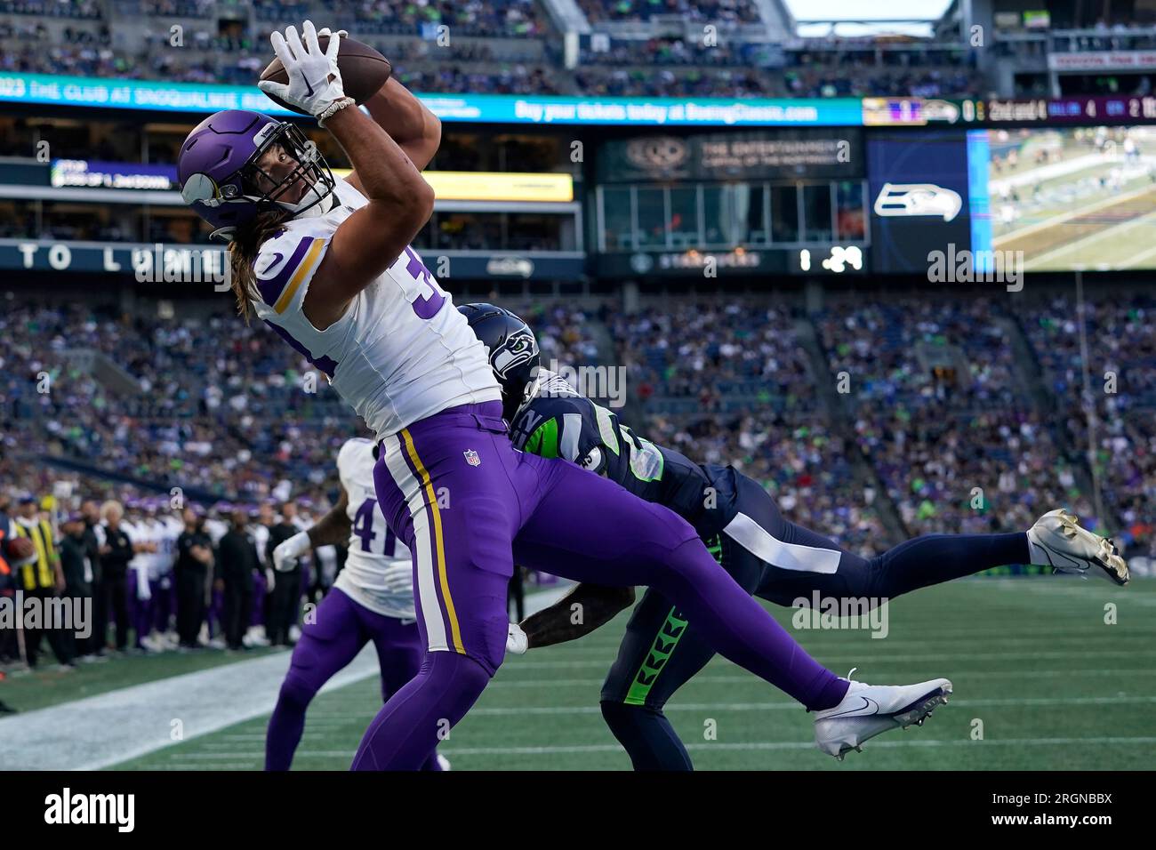Minnesota Vikings tight end Nick Muse, top, catches a touchdown pass ...