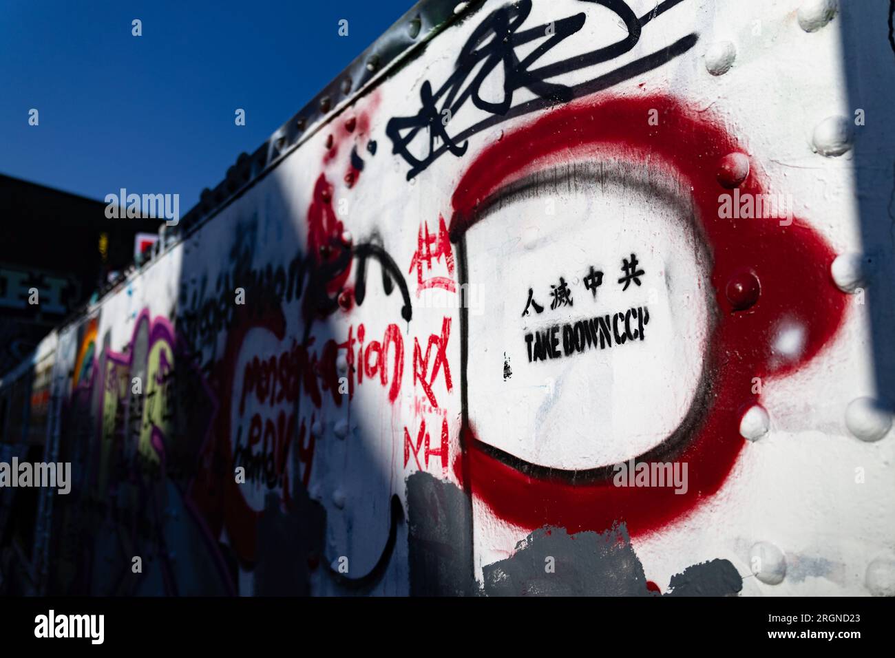 Anti-Beijing counter-slogans 'Take down CCP' is seen in Brick Lane ...