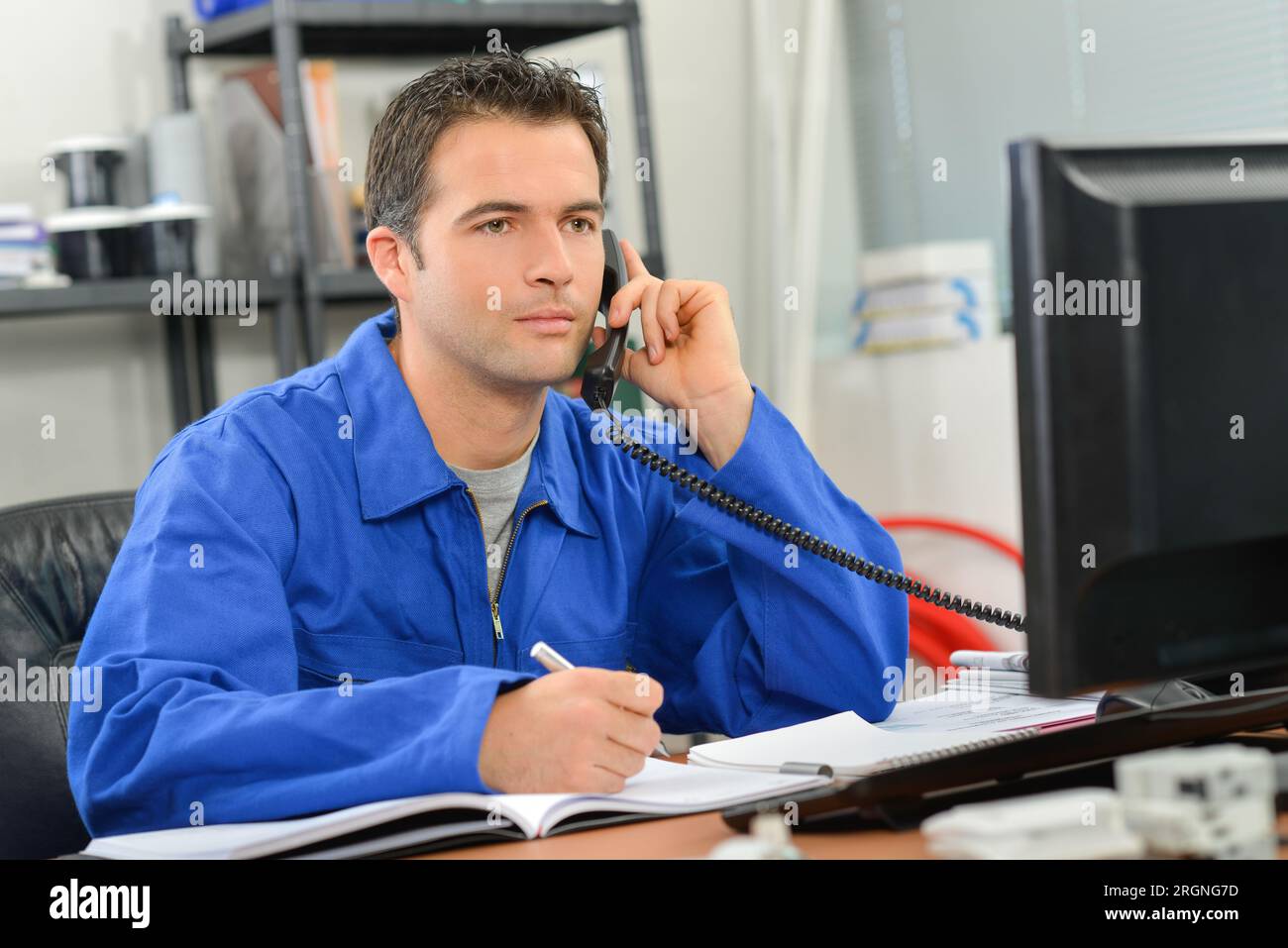 Person reading the computer manual hi-res stock photography and images ...