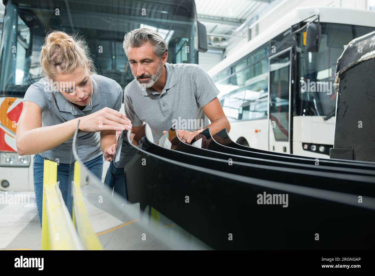 fixing a bus bumper after a crash Stock Photo - Alamy