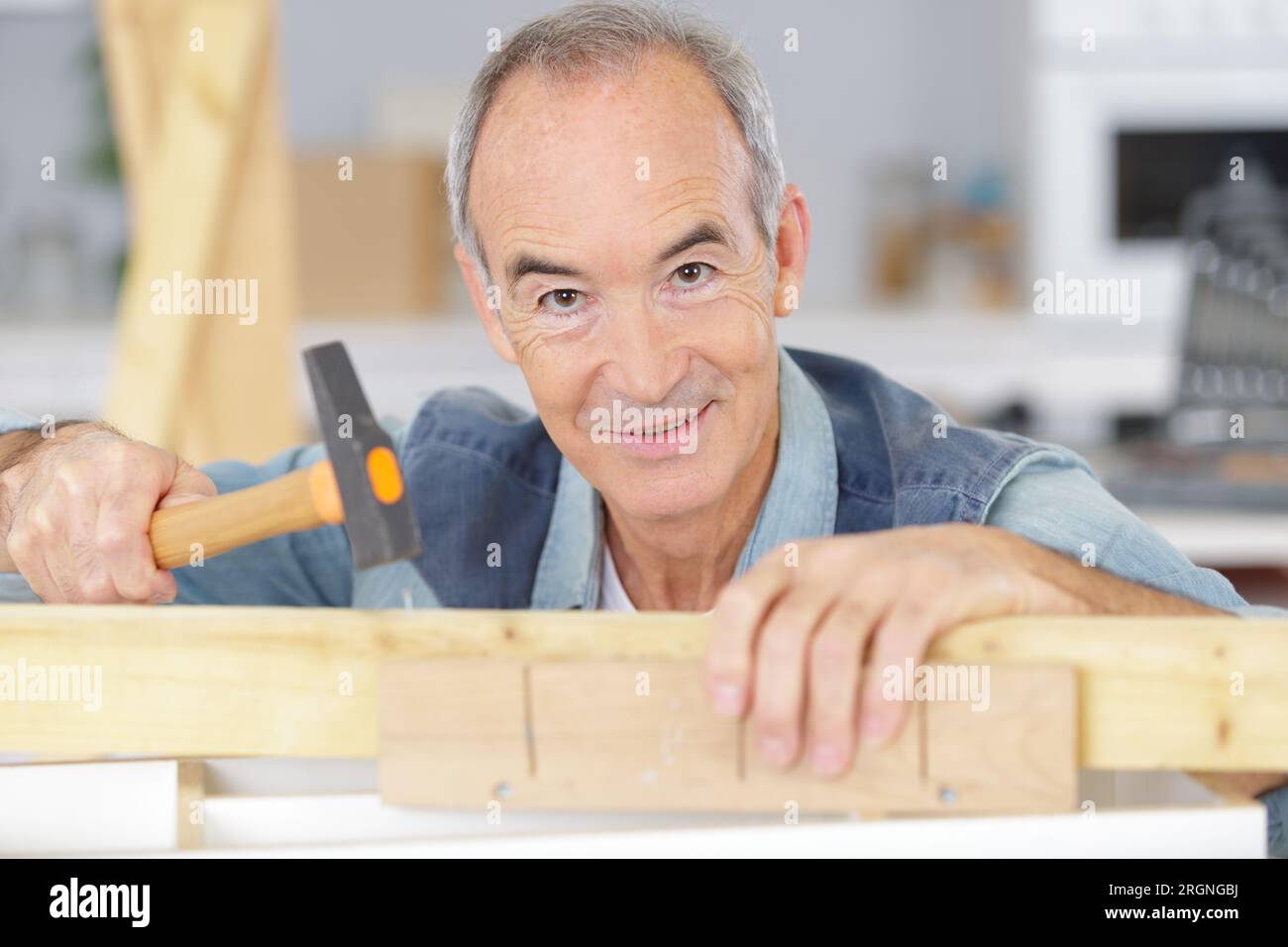 Senior carpenter restoring old hi-res stock photography and images - Alamy