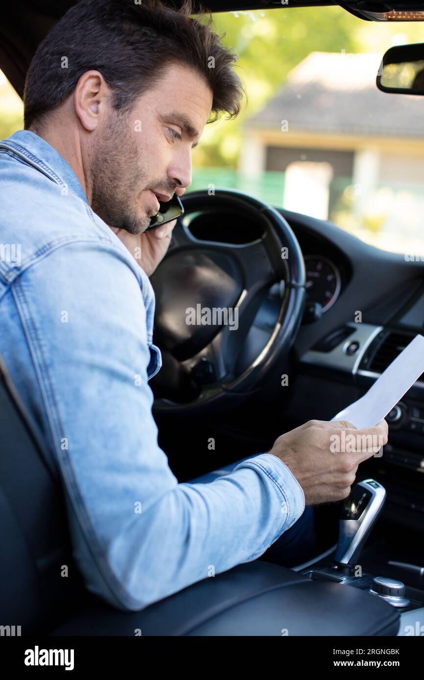 Paper map in car hi-res stock photography and images - Alamy
